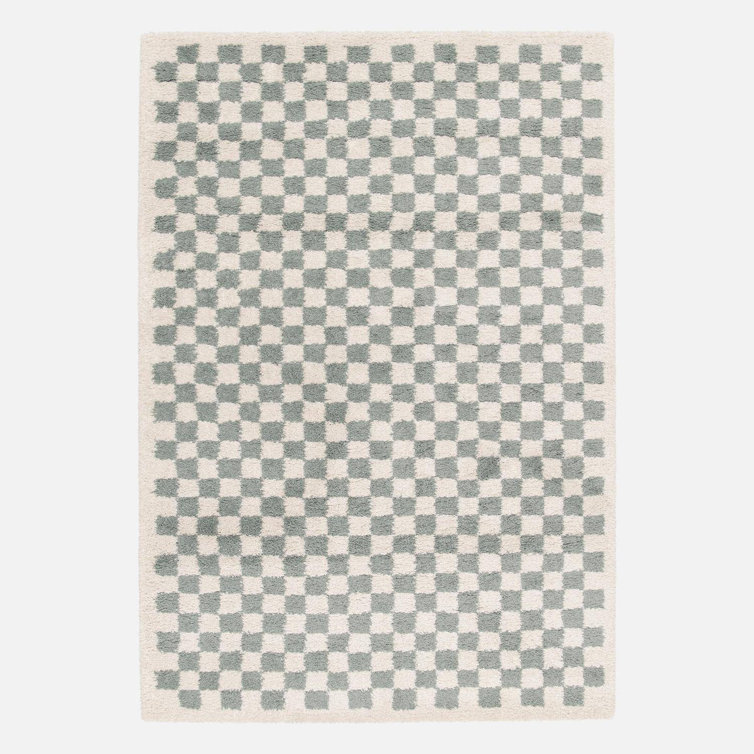 Light blue and cream checkerboard interior rug